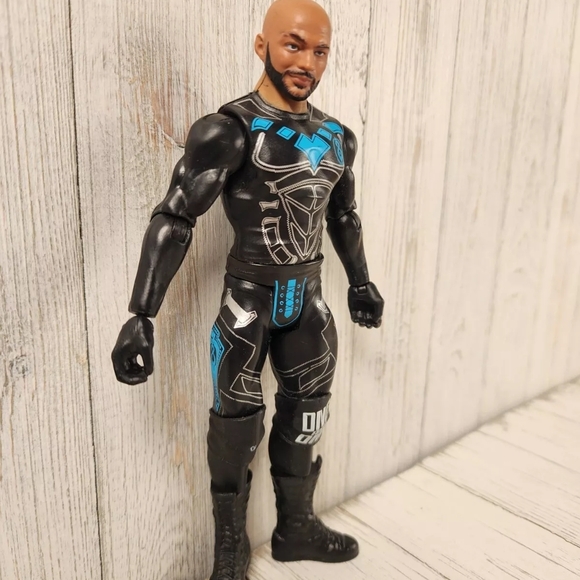 WWE | Toys | Action Figure With Black And Blue Suit | Poshmark